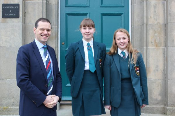 Mr McLoughlin pictured with McCullagh medalists Alana Burns Atkin and ...