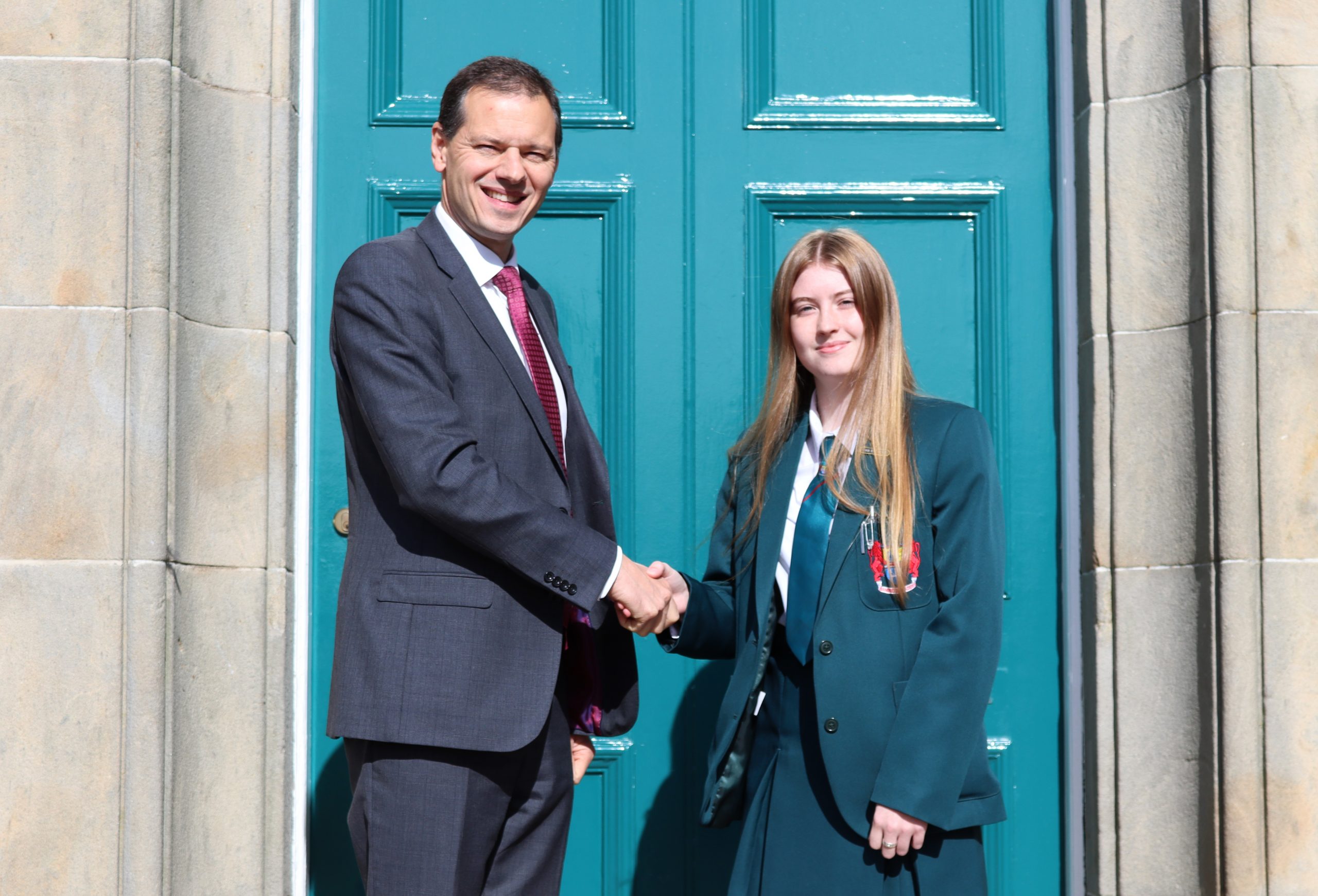 Principal Robin McLoughlin congratulating Lucy Hodgen. - Banbridge Academy